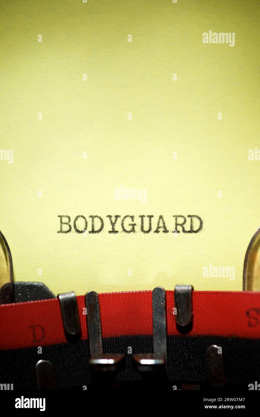 Bodyguard word written with a typewriter Stock Photo - Alamy