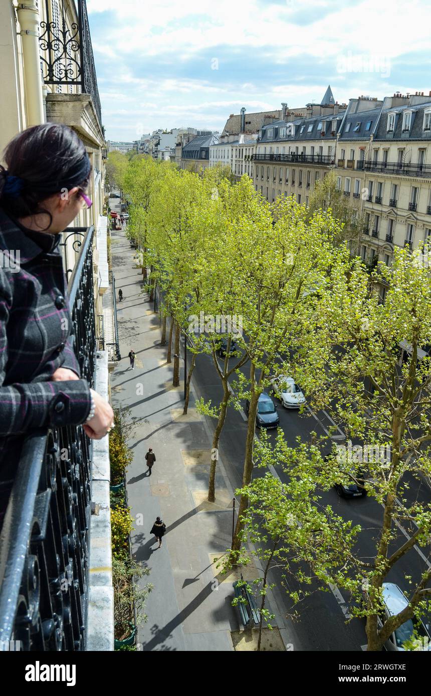 Female Viewing Paris France From The Balcony Of A Hotel On The Avenue 7780