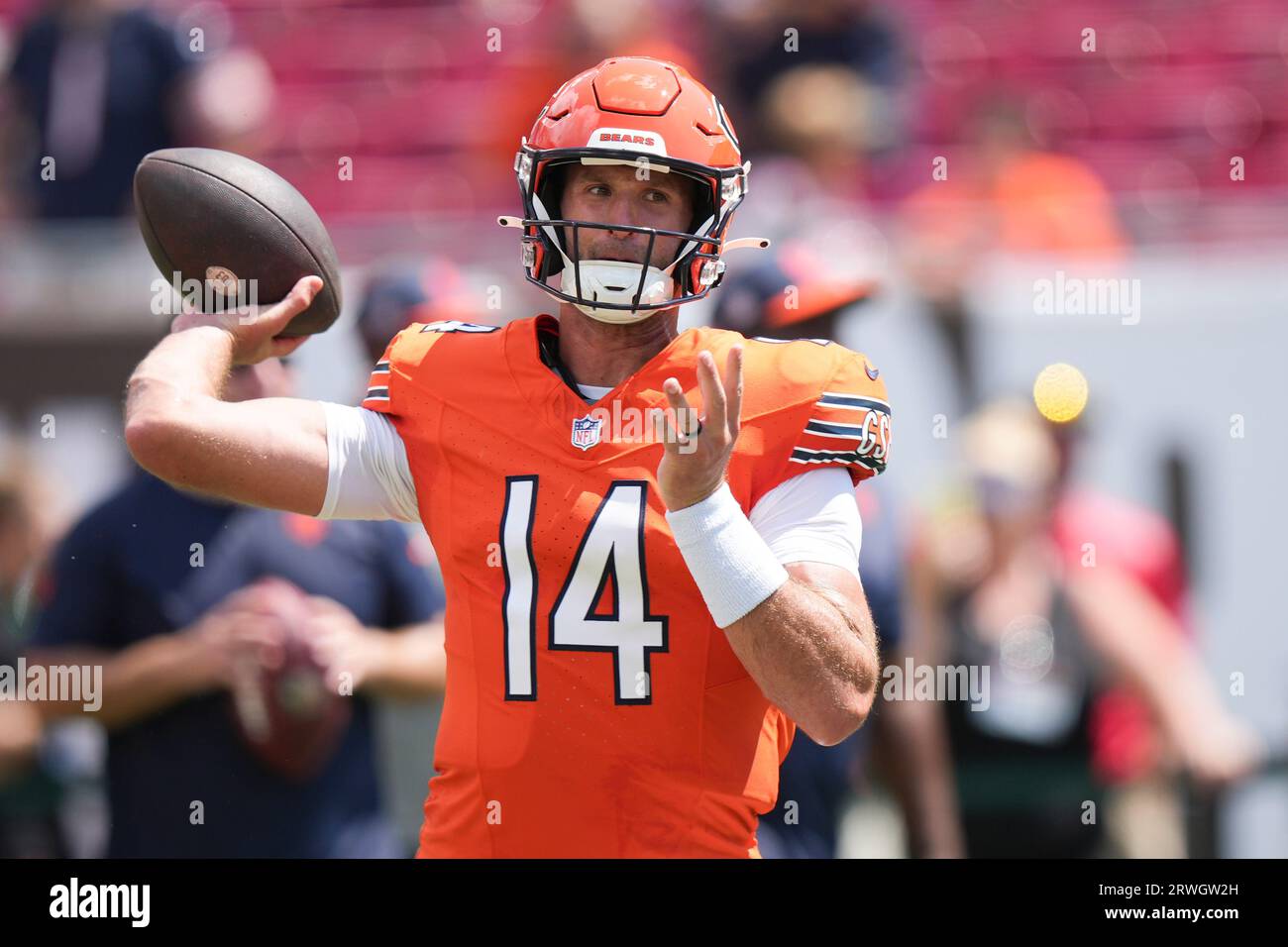 Chicago Bears quarterback Nathan Peterman (14) warms up throwing passes ...