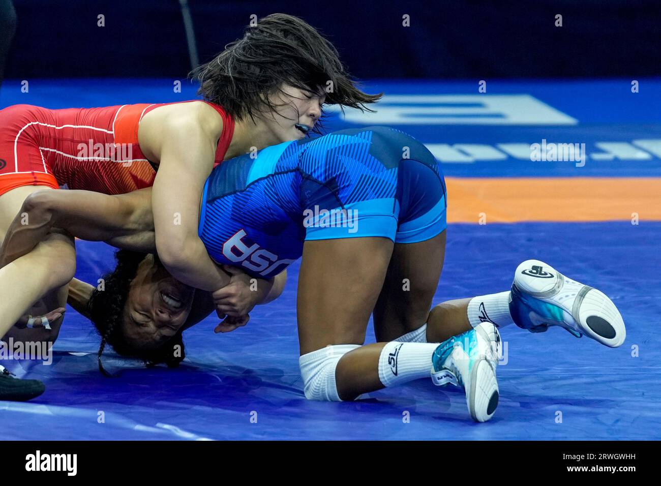 Haruna Okuno of Japan, top, and Jacarra Gwenisha Winchester of US compete in their women's ...