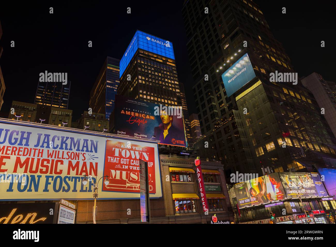 View of night Broadway with skyscrapers in Manhattan with advertising ...