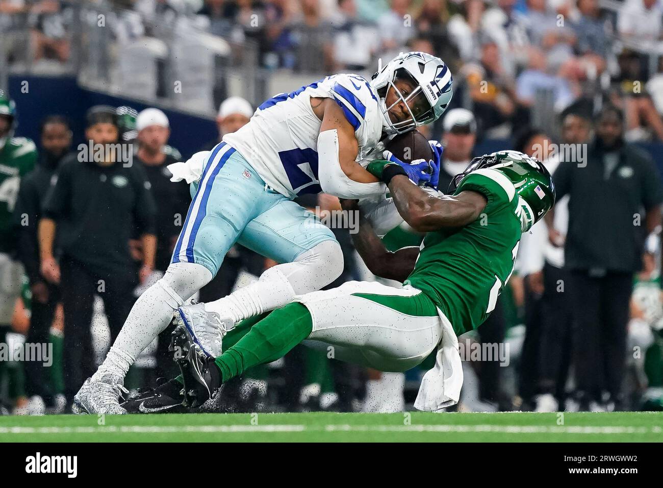 Dallas Cowboys running back Tony Pollard (20) is tackled by New York ...