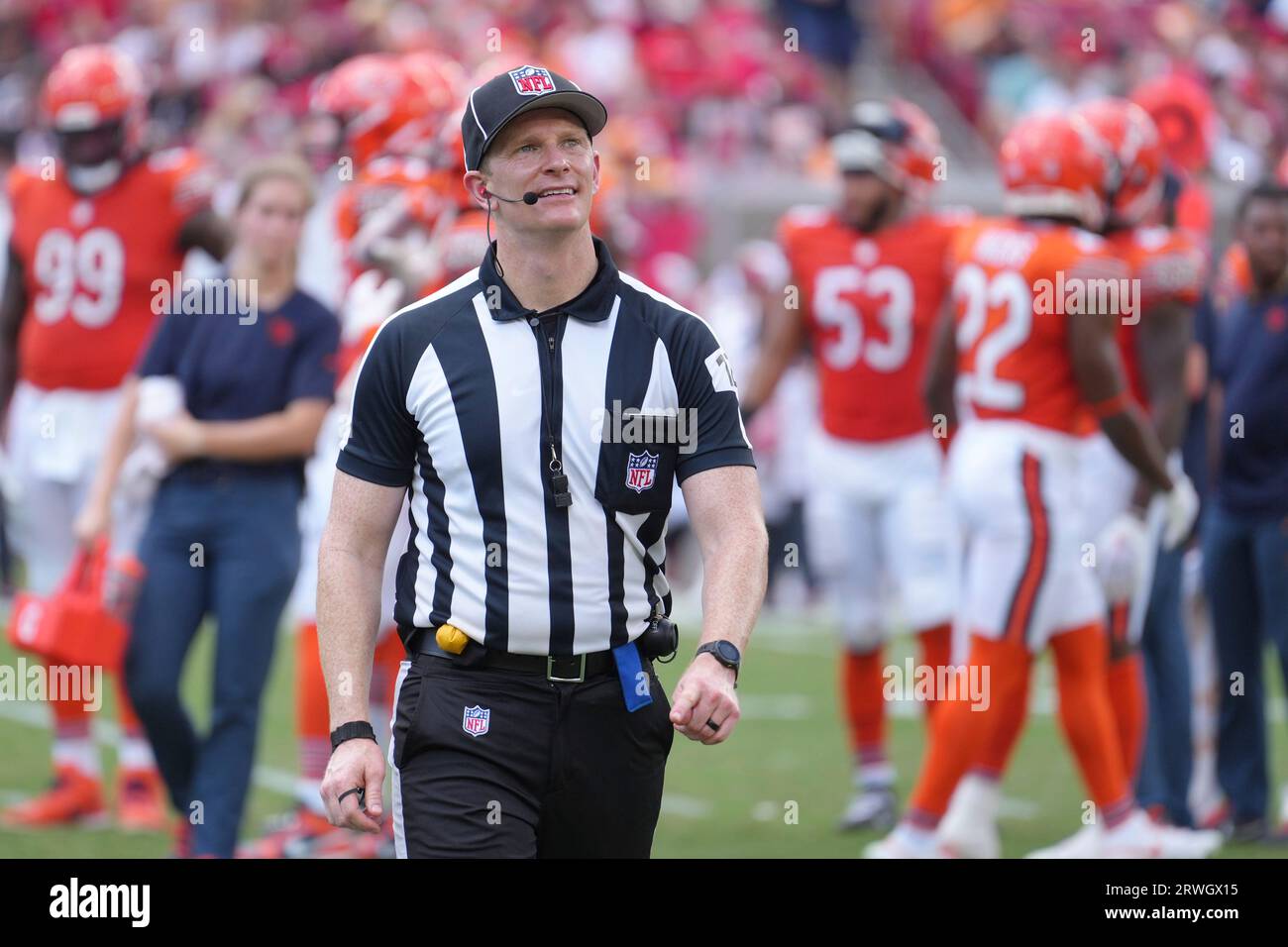 Side judge Chad Hill (125) wartches the video board during a timeout ...