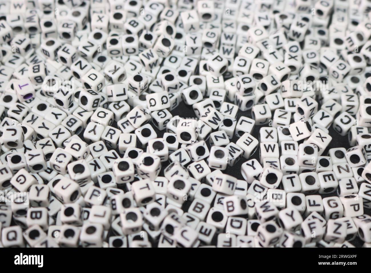 little white cubes or dices with English letters image Stock Photo - Alamy