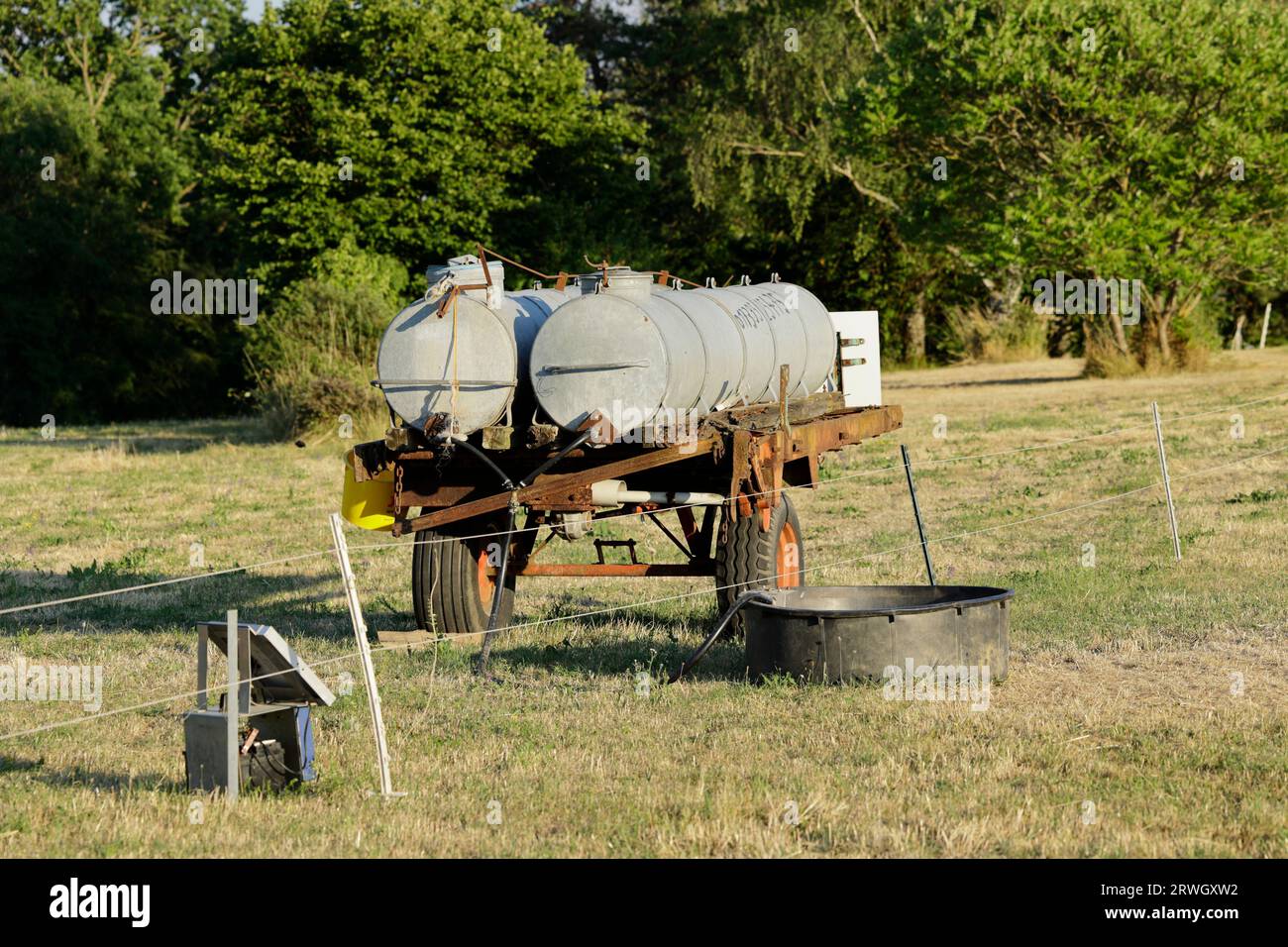Trailer with water tank serves as a drinking trough for animals Stock ...