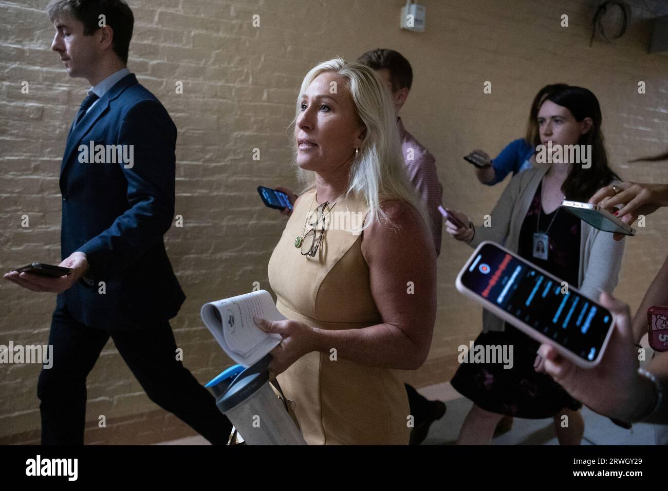 Rep. Marjorie Taylor Greene (R-Ga.) speaks with reporters after a House ...
