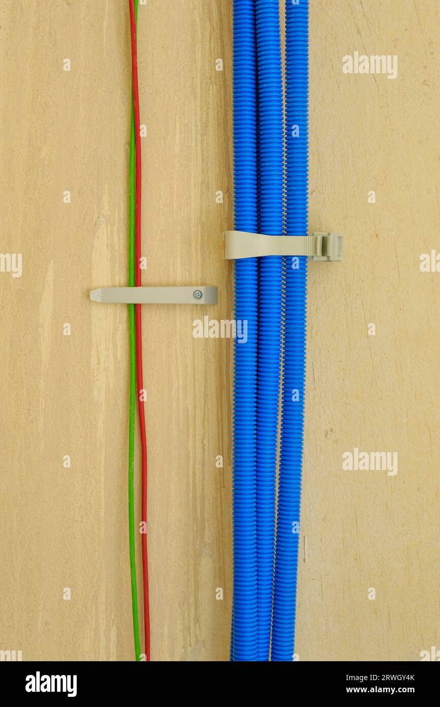 Network Cables And Conduits On A Wall, Construction Site, Renovation Of ...