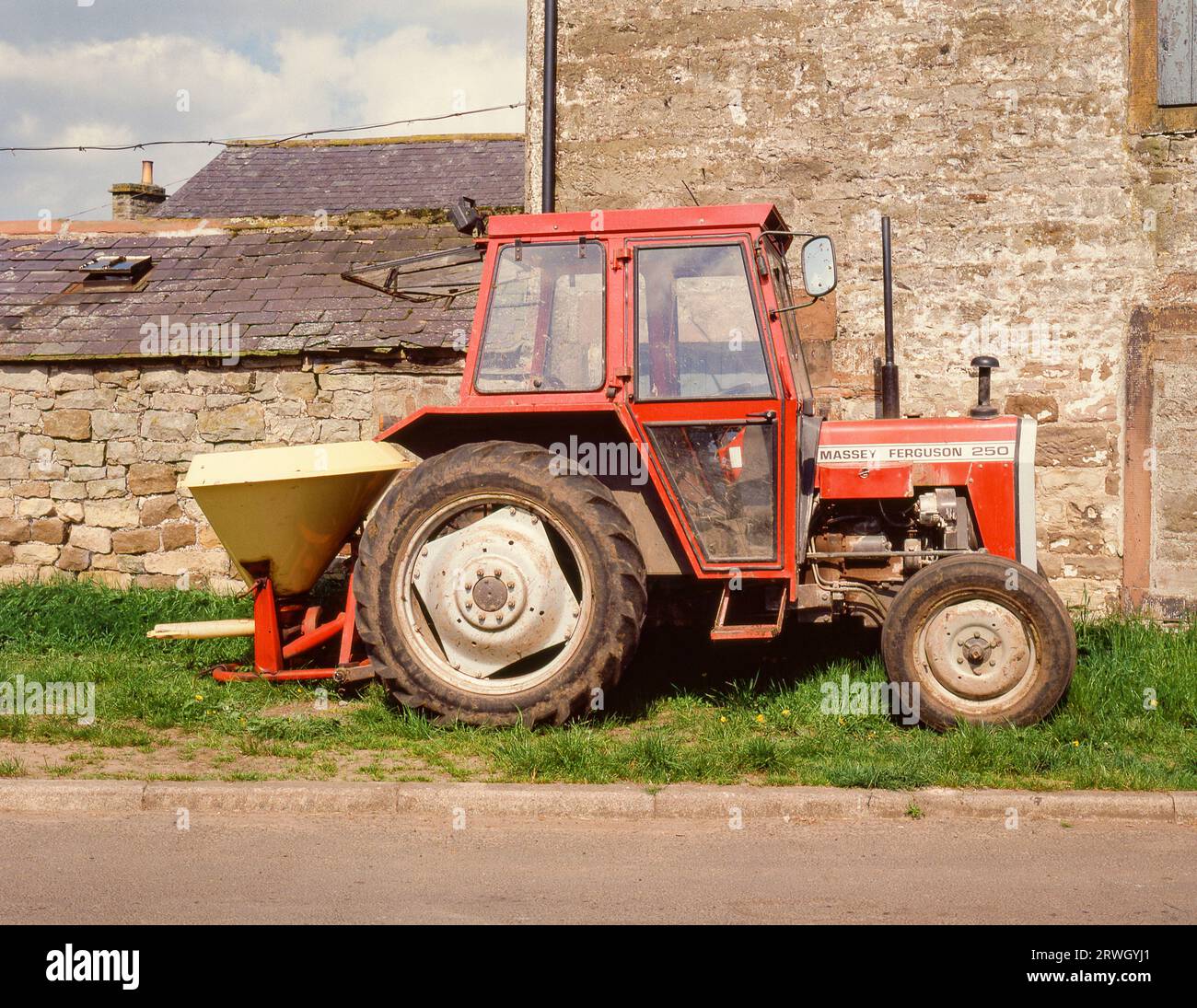 Red Tractor at a farm Stock Photo - Alamy