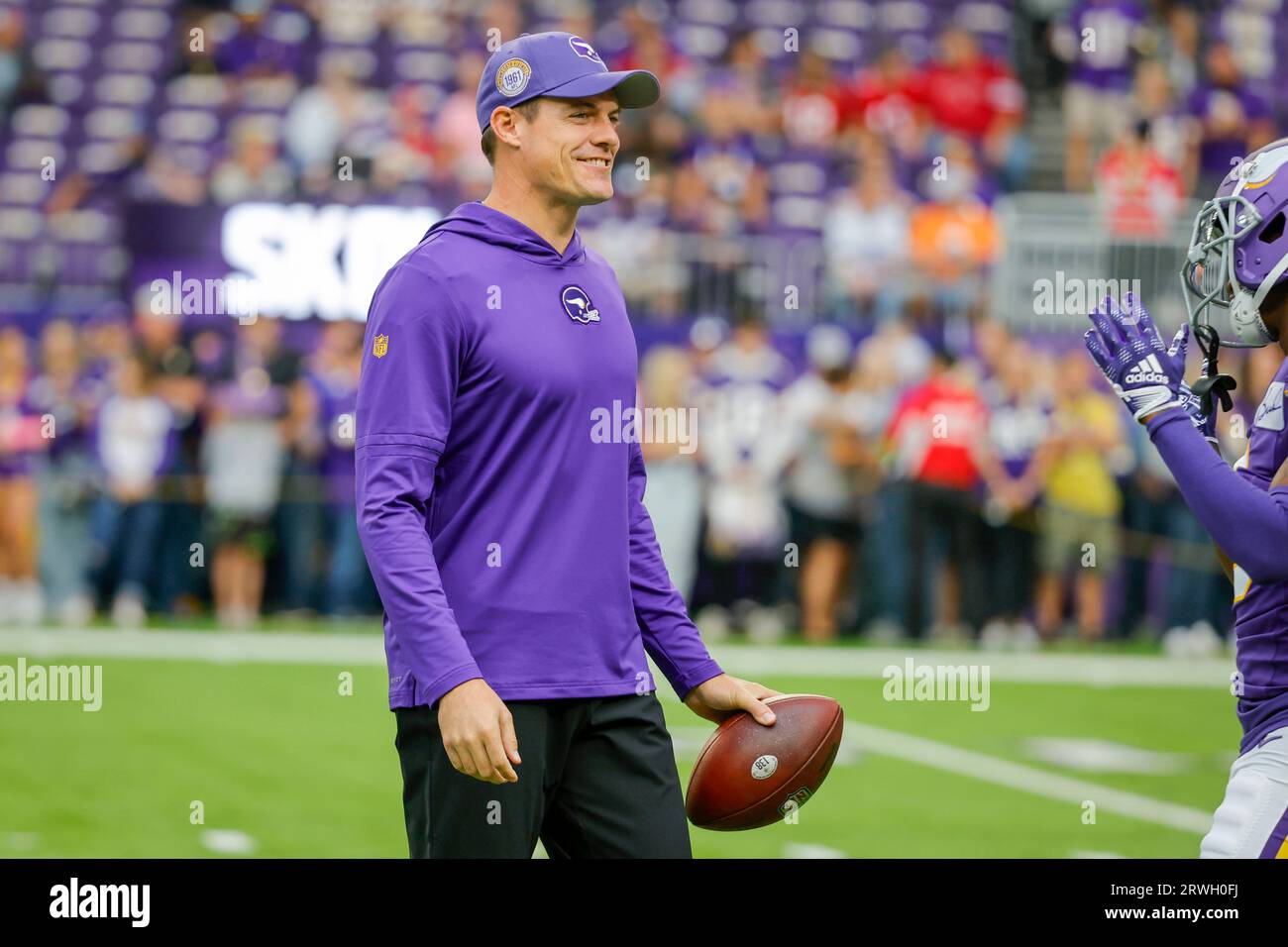 Minnesota Vikings head coach Kevin O'Connell plays catch on the field ...