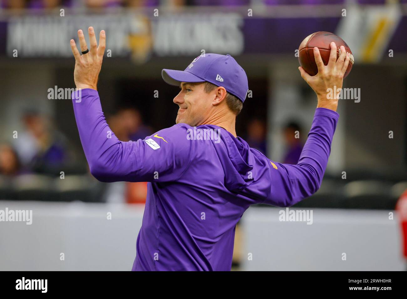Minnesota Vikings head coach Kevin O'Connell plays catch on the field ...