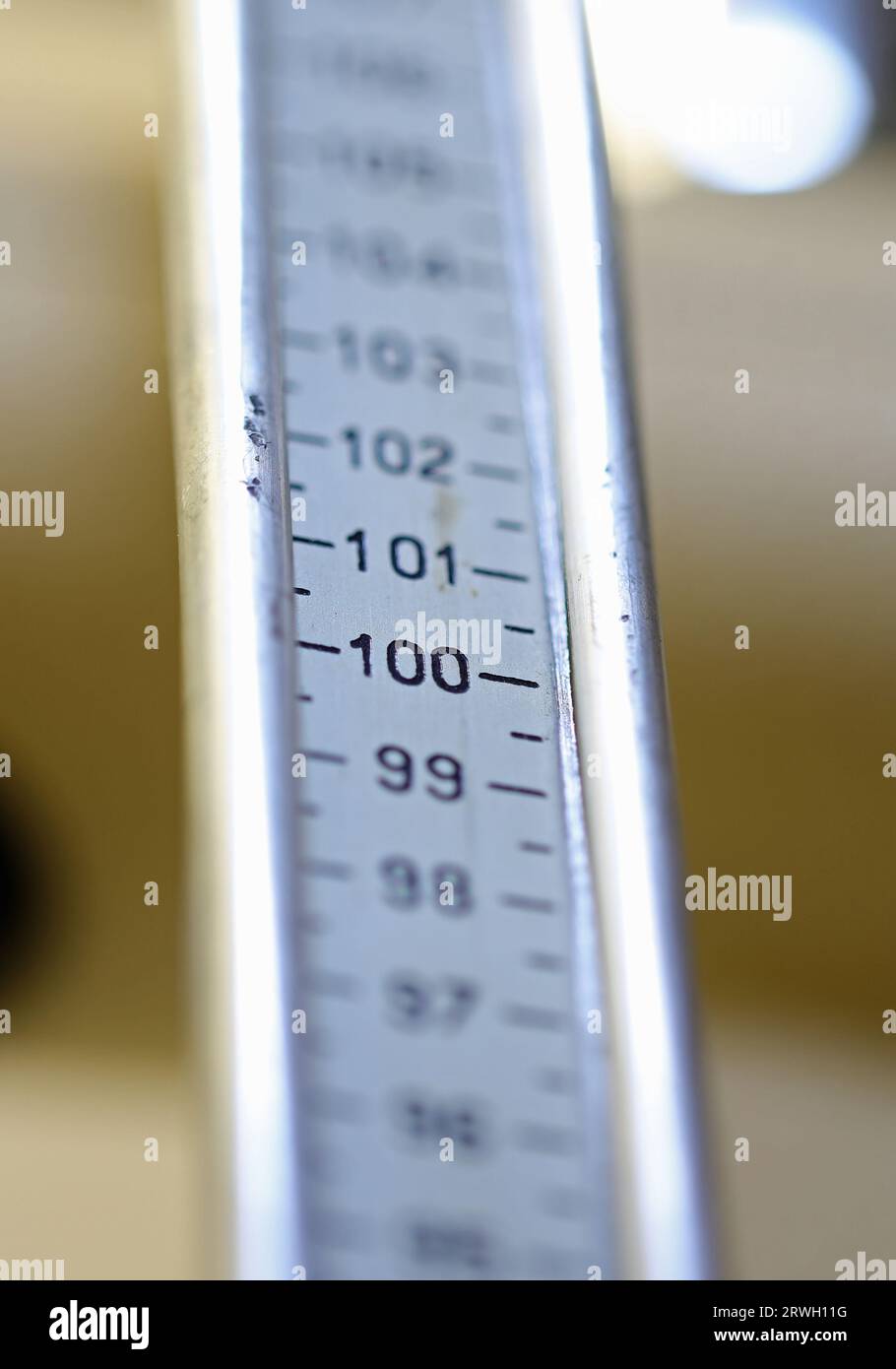 number 100 of the graduated rod of bathroom scales in the doctor s ...