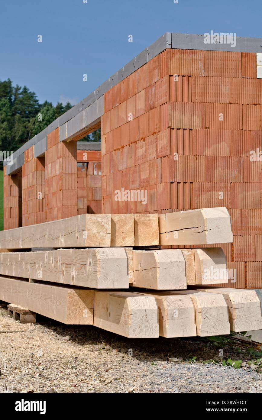 Construction of unfinished house made of bricks and timber. Building ...