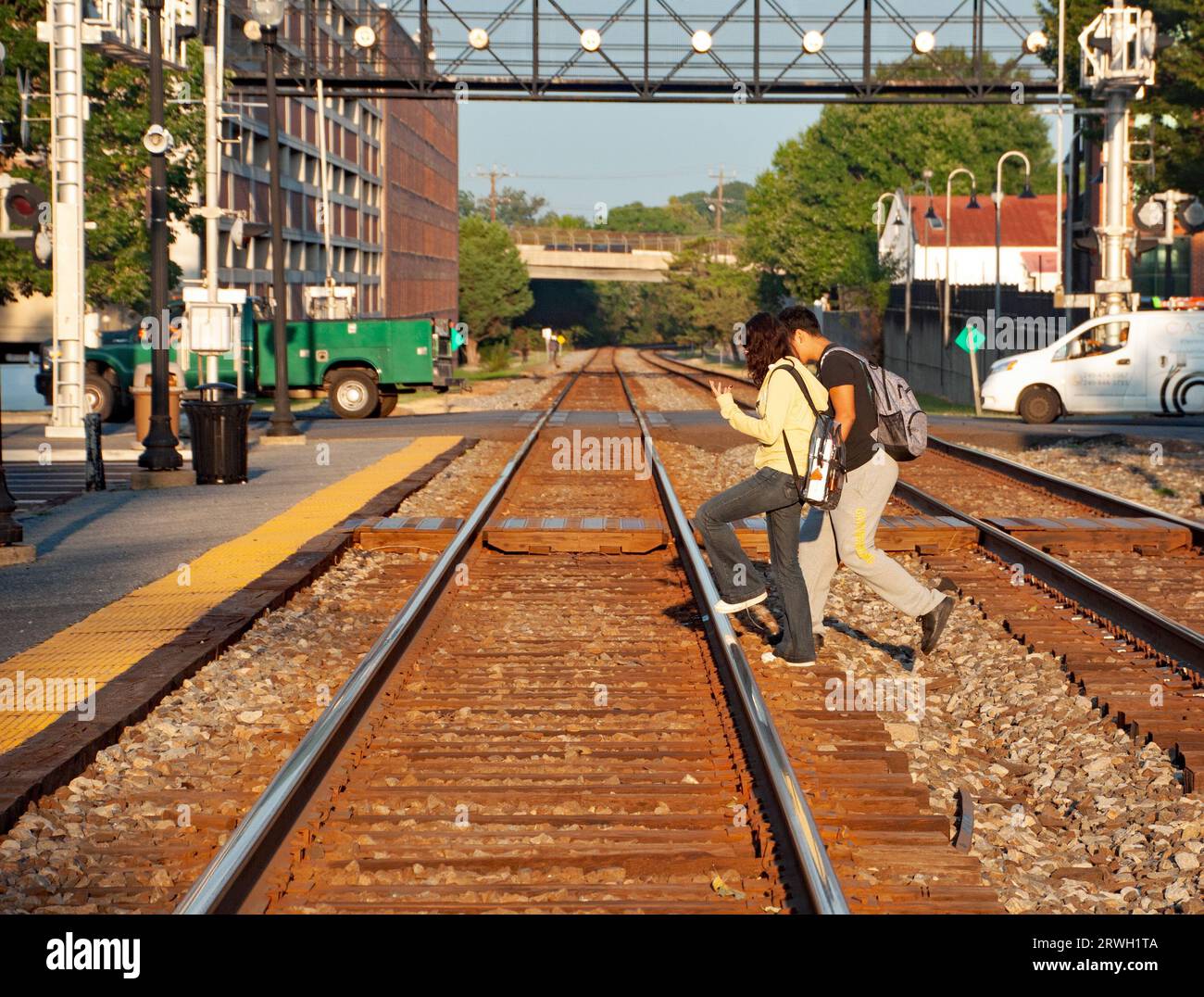 Students walking to school crossing the railroad tracks at Gaithersburg ...