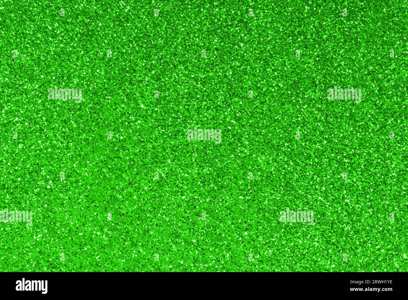 GREEN GLITTERED background with bright reflections and small lights ...