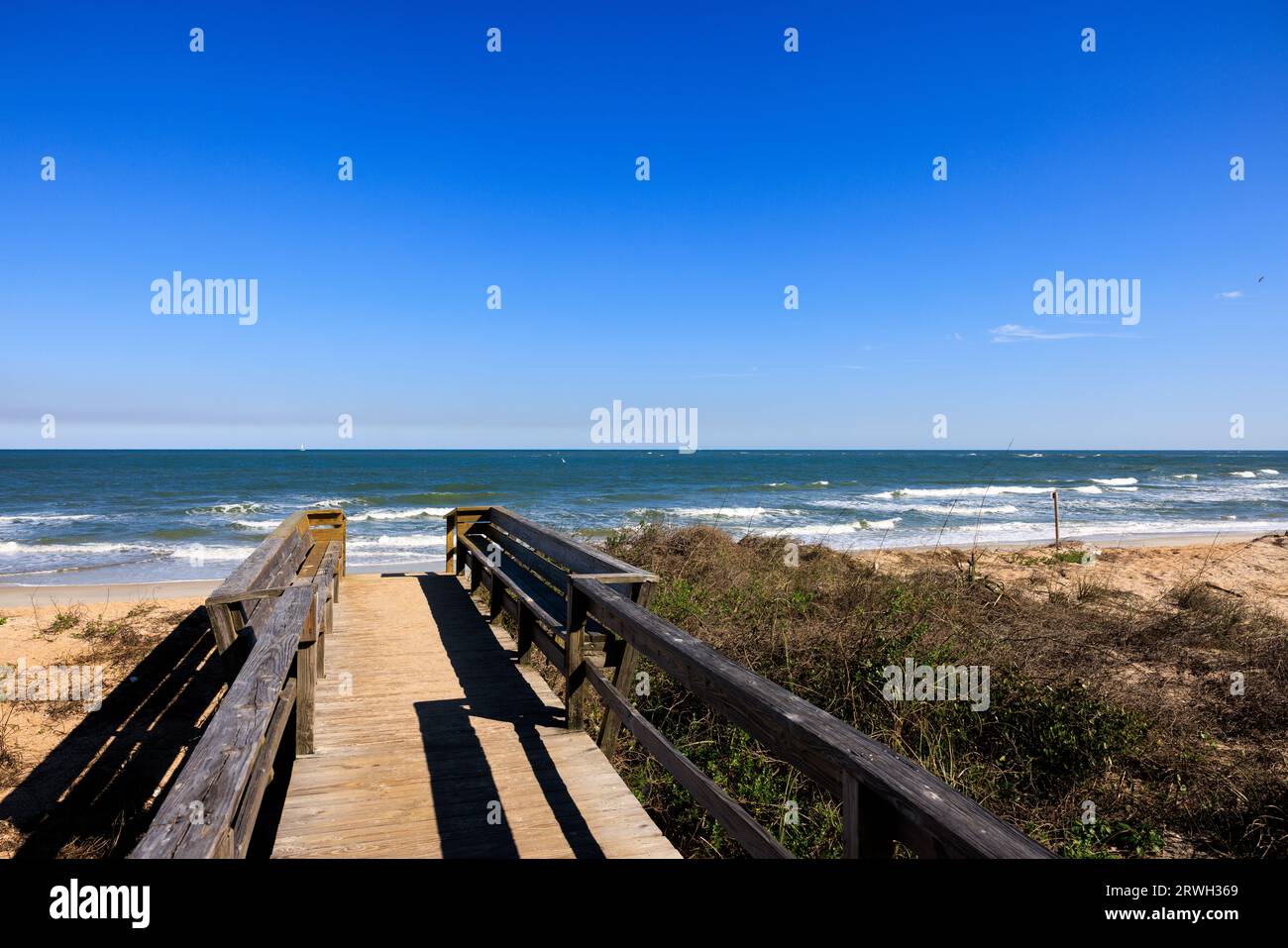 florida beach walk next to the ocean Stock Photo - Alamy