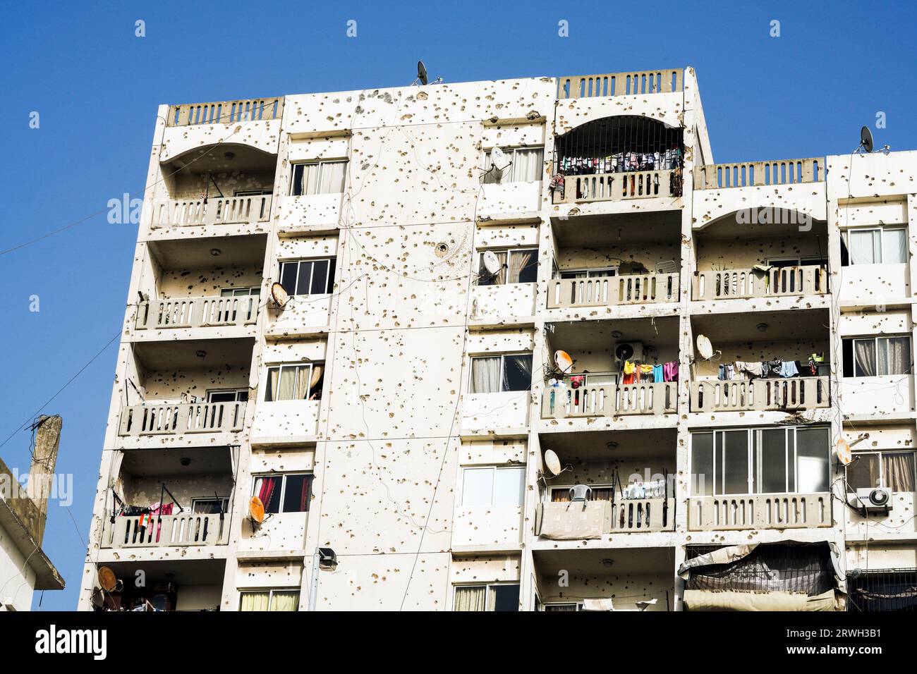 Residential buildings riddled with bullet holes in Tripoli, Lebanon ...