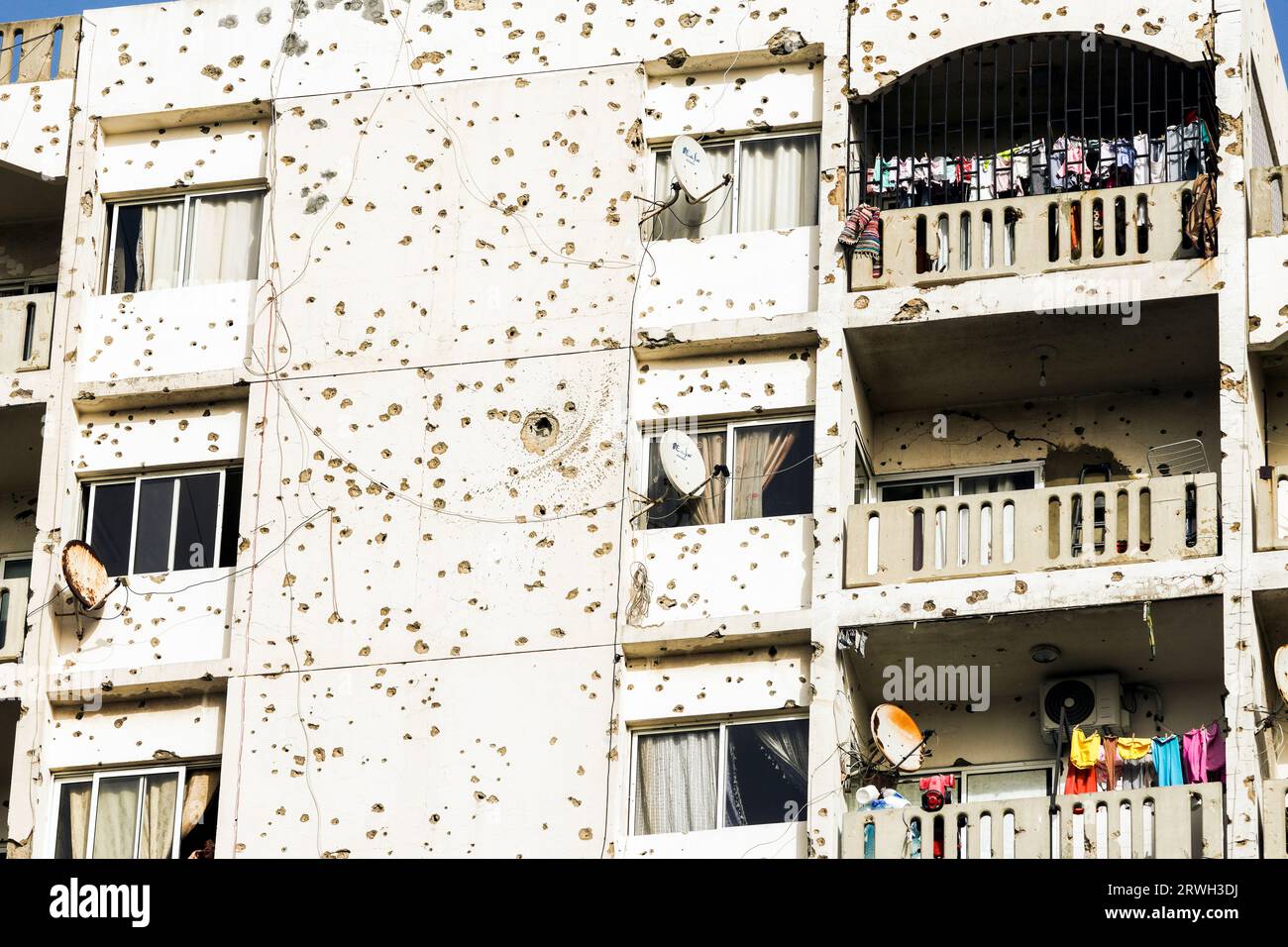 Residential buildings riddled with bullet holes in Tripoli, Lebanon ...