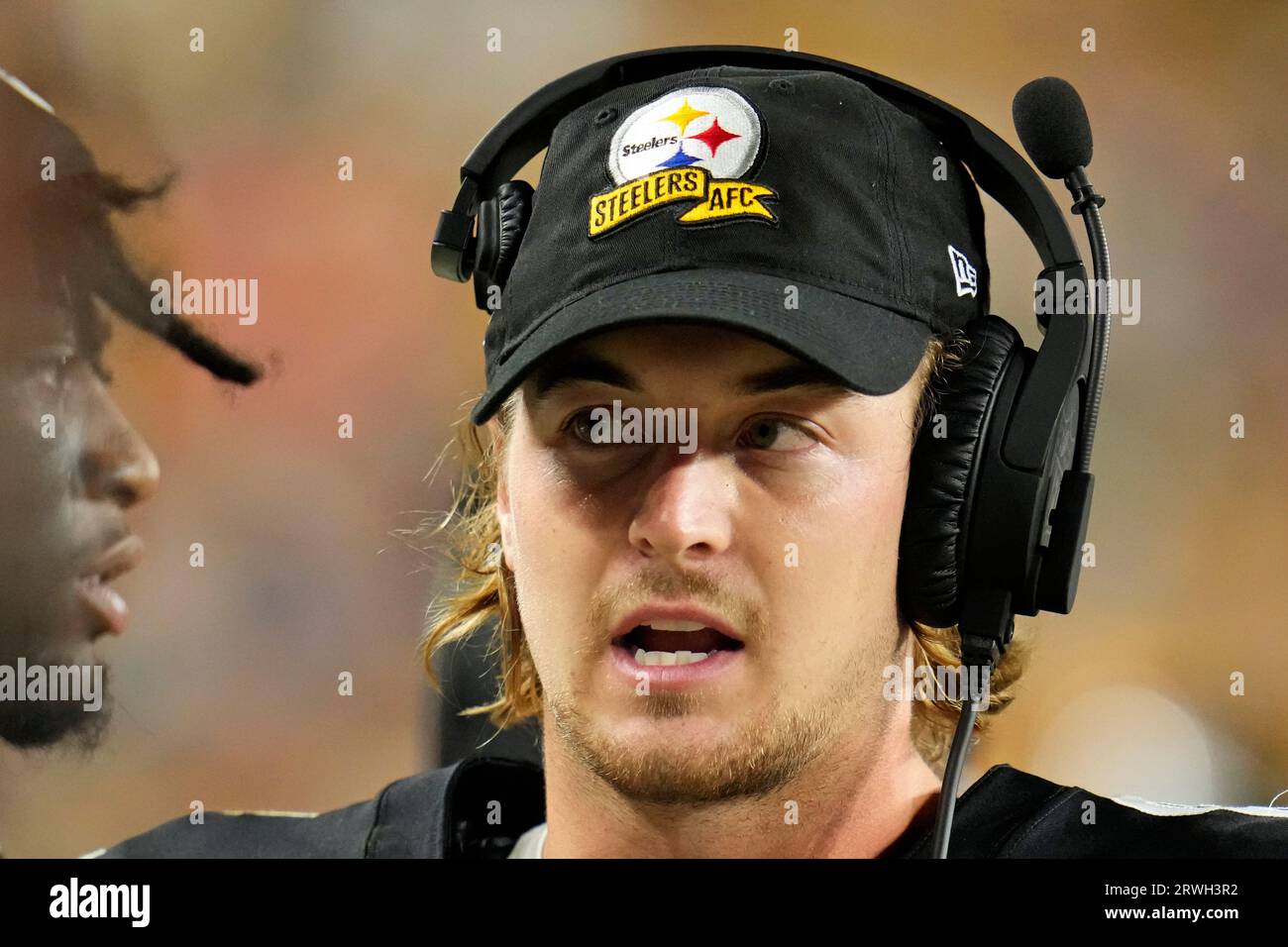 Pittsburgh Steelers quarterback Kenny Pickett, right, talks with wide ...
