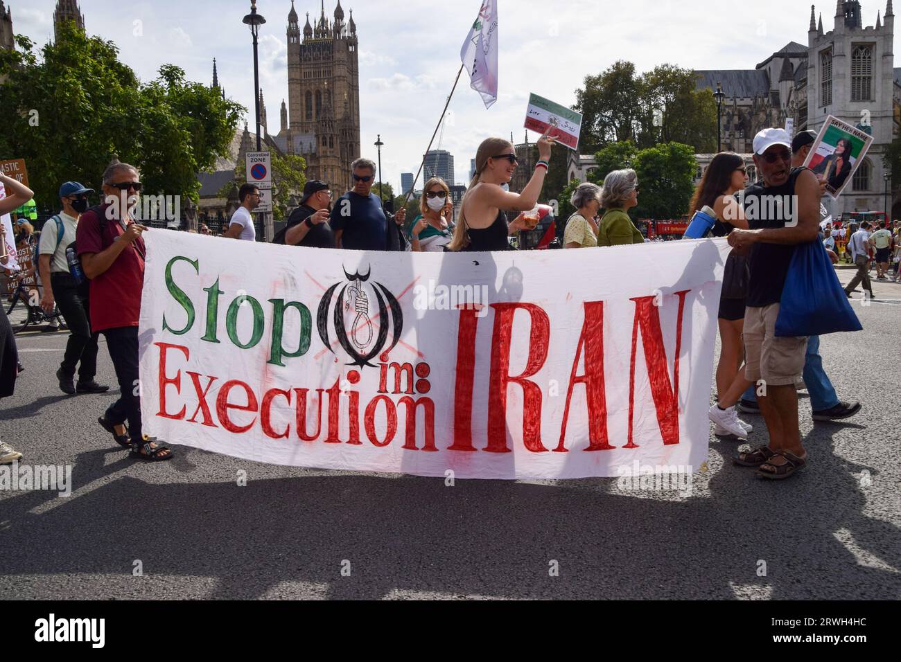London, UK. 16th September 2023. Protesters march in Parliament Square ...