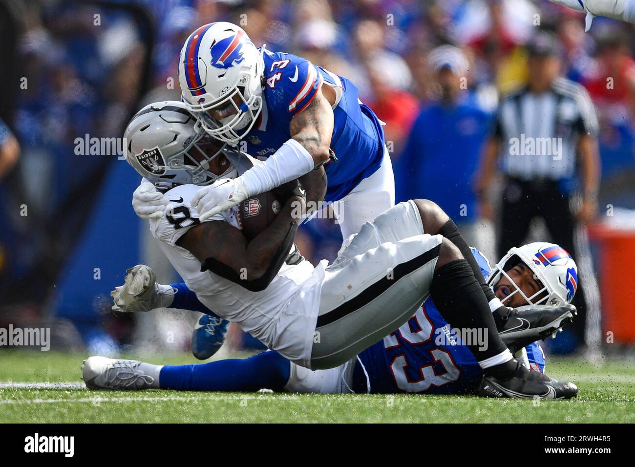 Buffalo Bills linebacker Terrel Bernard, top, and safety Micah Hyde (23 ...