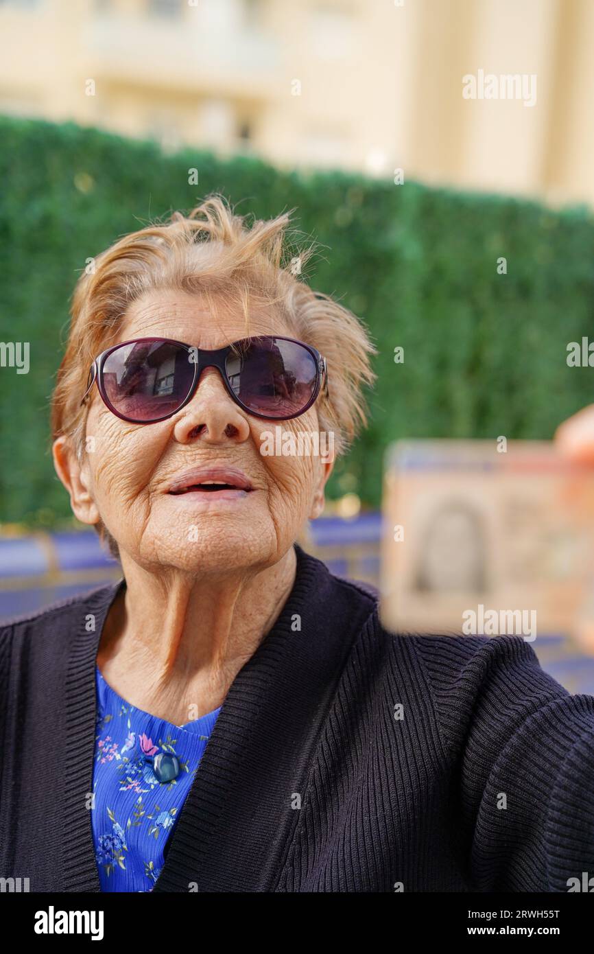 retired woman showing National identity document. Old age ...