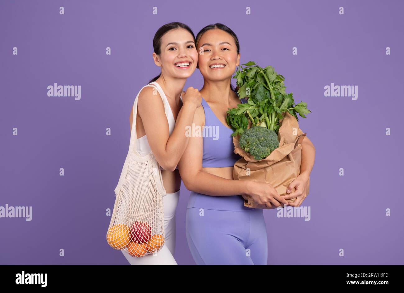 Sport healthy food, dieting concept. Happy diverse sportswomen posing ...