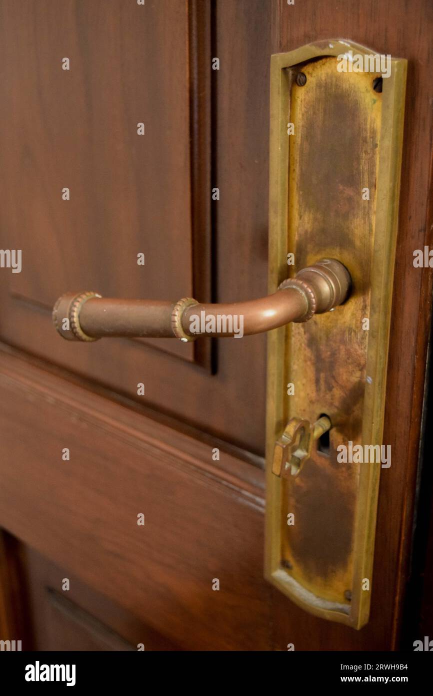 Old handle and lock of a door Stock Photo - Alamy