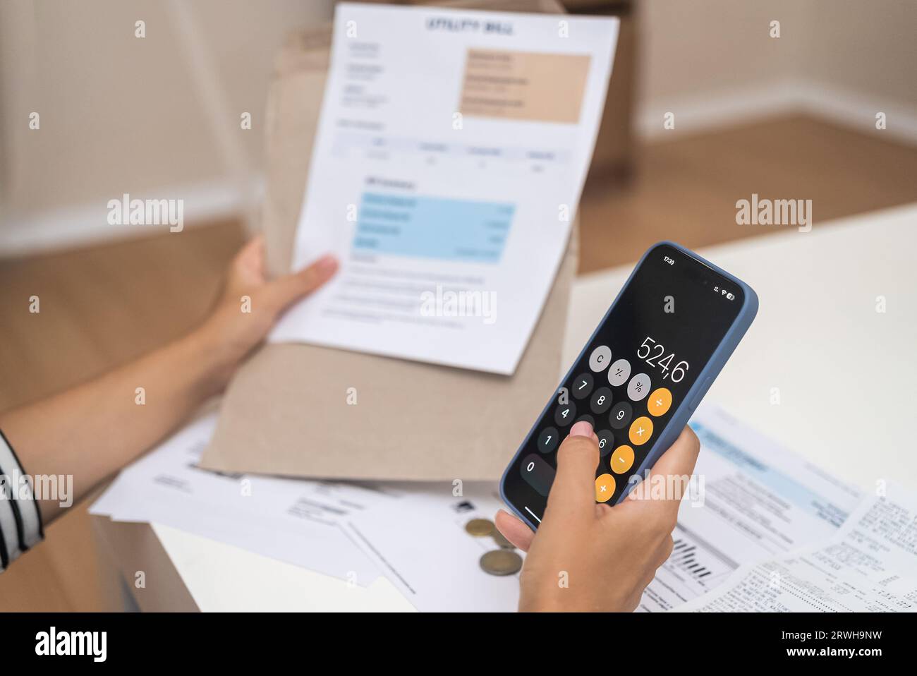 Woman using tally accounting hi-res stock photography and images - Alamy