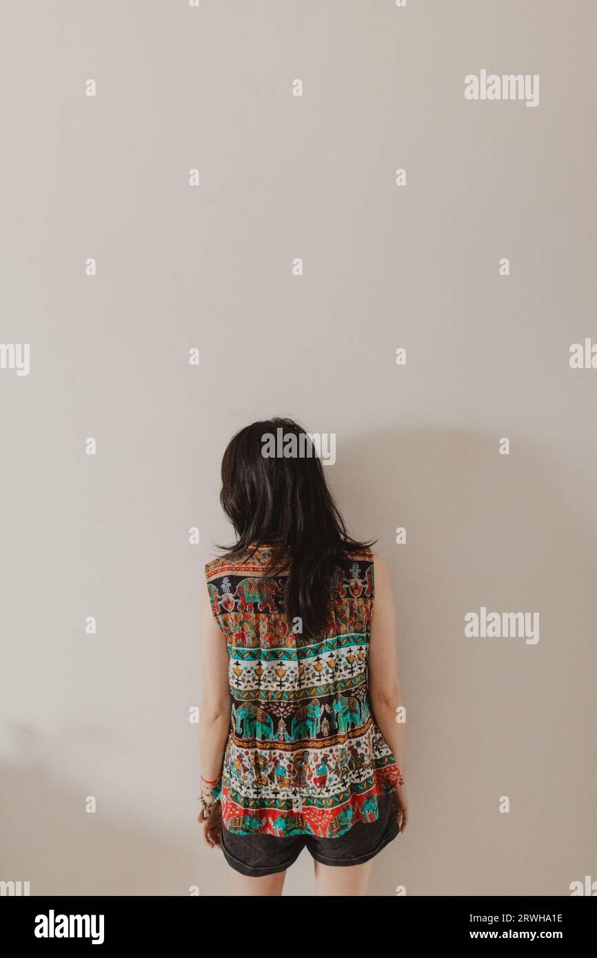 woman backwards on an white background Stock Photo - Alamy