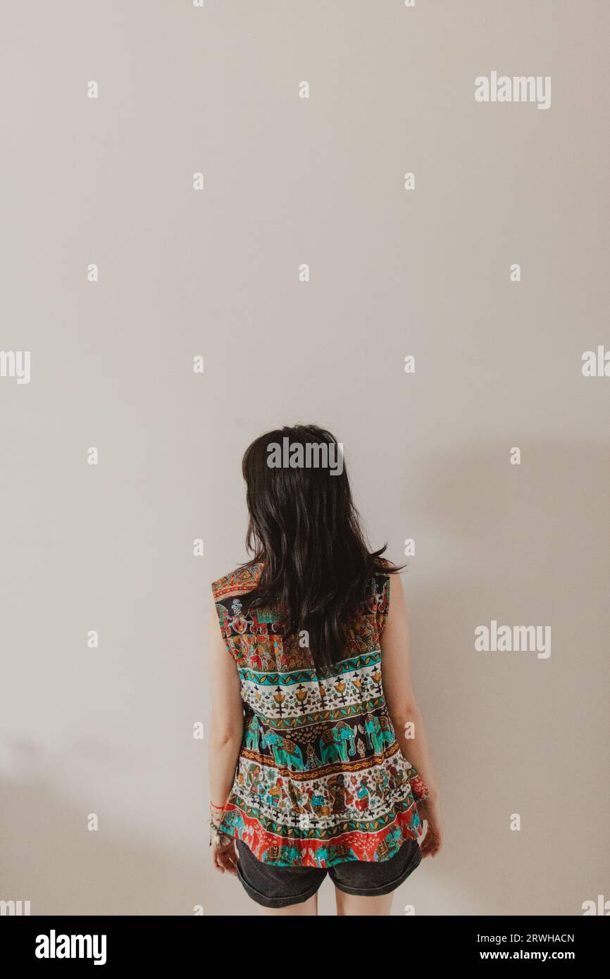 young woman backwards wearing boho outfit Stock Photo - Alamy