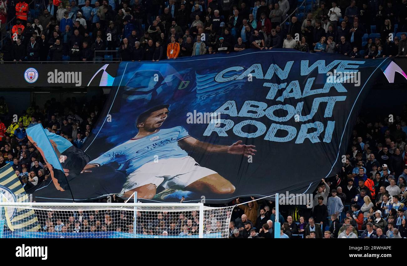 MANCHESTER, UK. 19th Sep, 2023. Manchester City fans float a giant flag ...