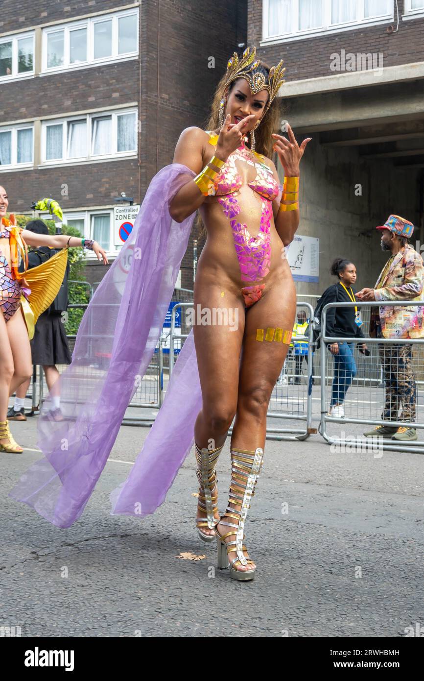 NOTTING HILL, LONDON, ENGLAND - 28 August 2023: Woman wearing a costume ...