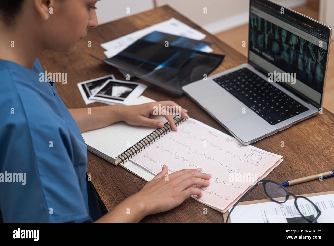 Cardiologist ECG Analysis: examines patient cardiogram ECG test results ...