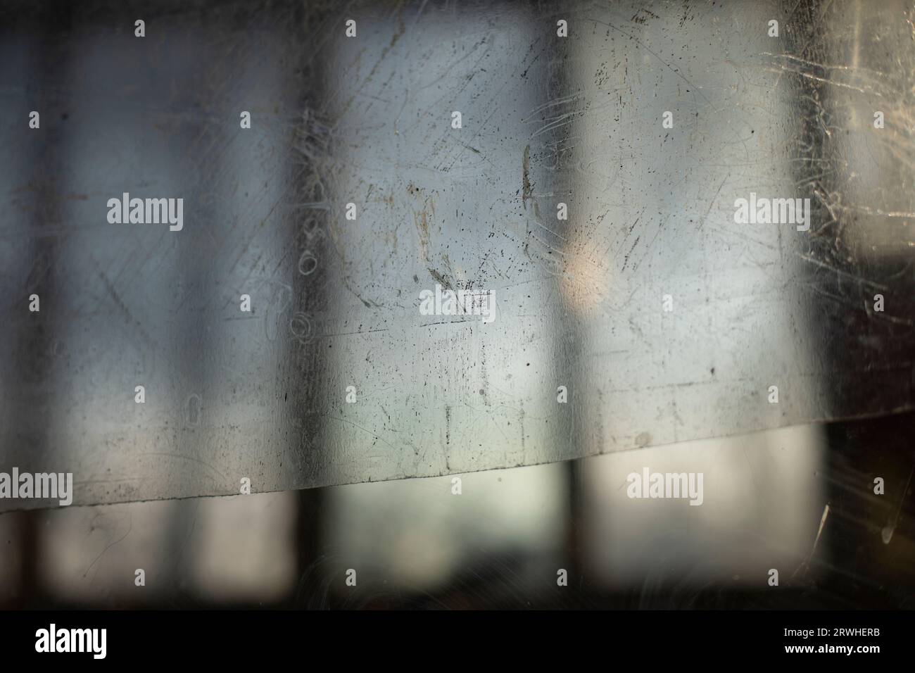 Cloudy glass. Scratches of transparent surface. Scratched window glass ...