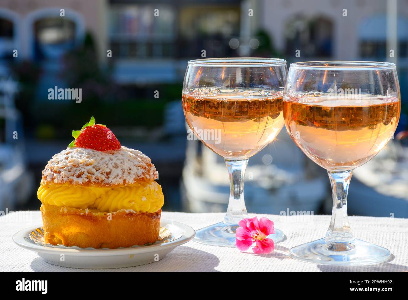 Wine and cakes of French Riviera, glasses of cold rose Cote de Provence ...