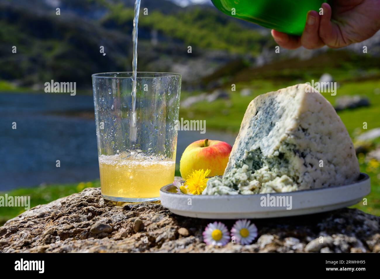Glass of natural Asturian cider made from fermented apples, Asturian ...