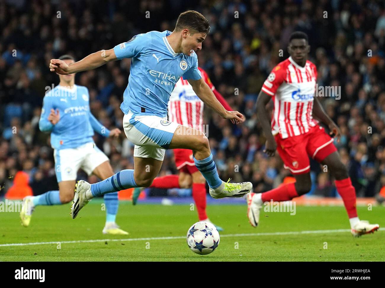 Manchester City's Julian Alvarez scores their side's first goal of the ...