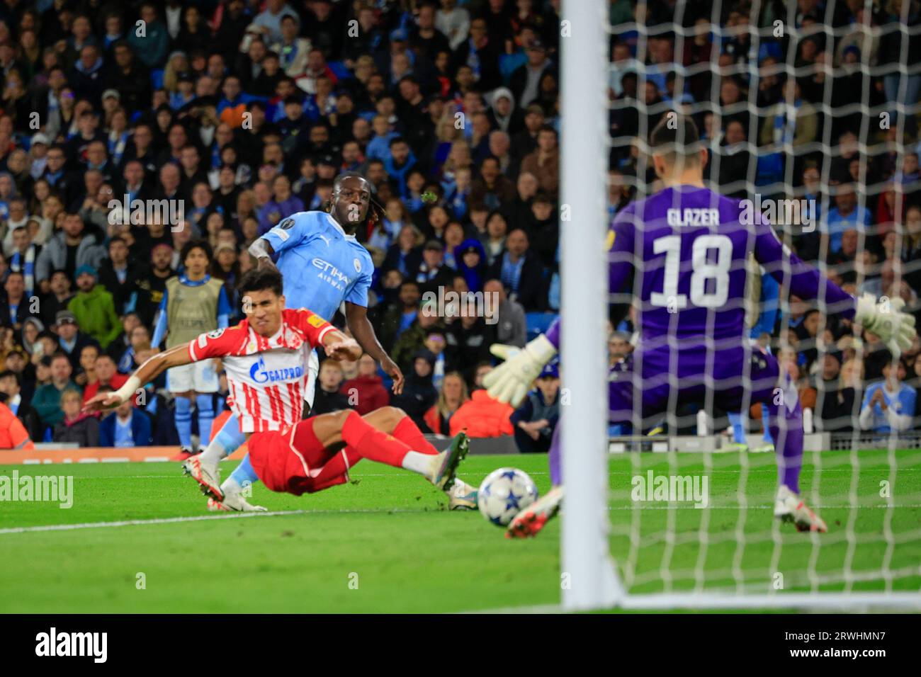 Jeremy Doku #11 of Manchester City has a shot on goal during the UEFA ...