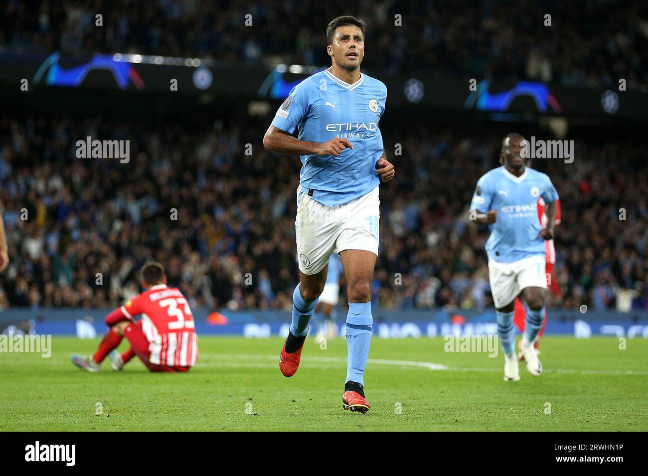 Manchester City's Rodri (centre) celebrates scoring their side's third ...