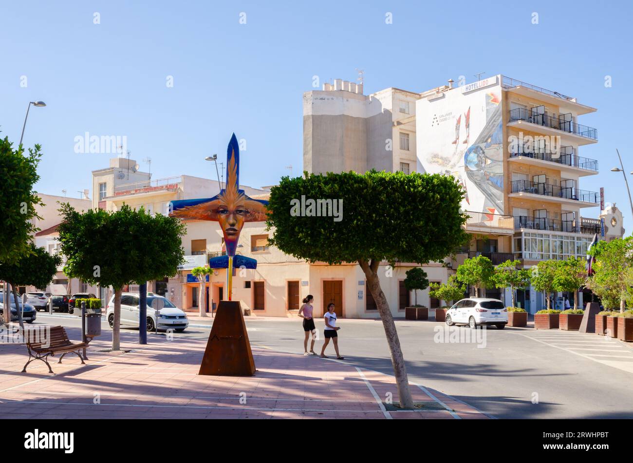 SANTIAGO DE LA RIBERA, SPAIN - JUNE 10, 2022 Statues presenting model ...
