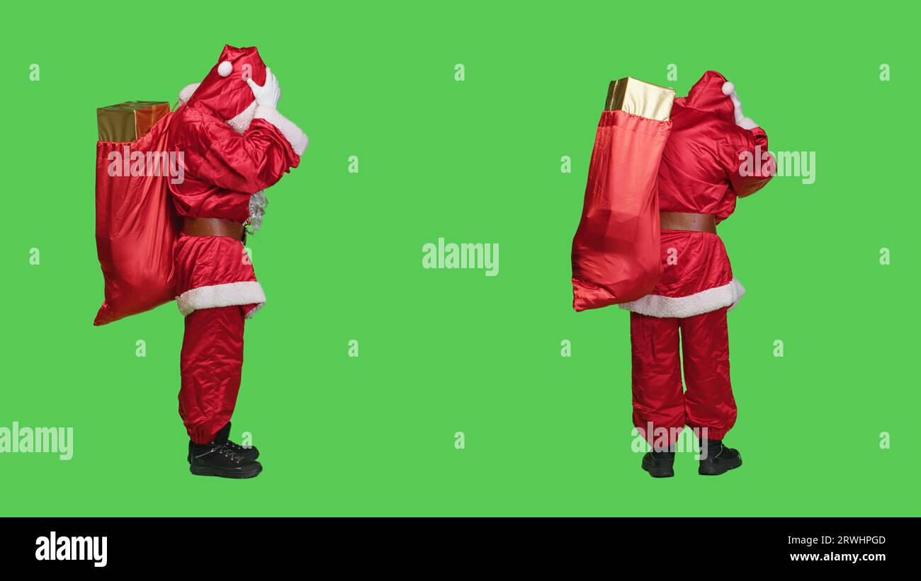 Saint nick with migraine carries sack, trying to deliver gifts boxes to ...