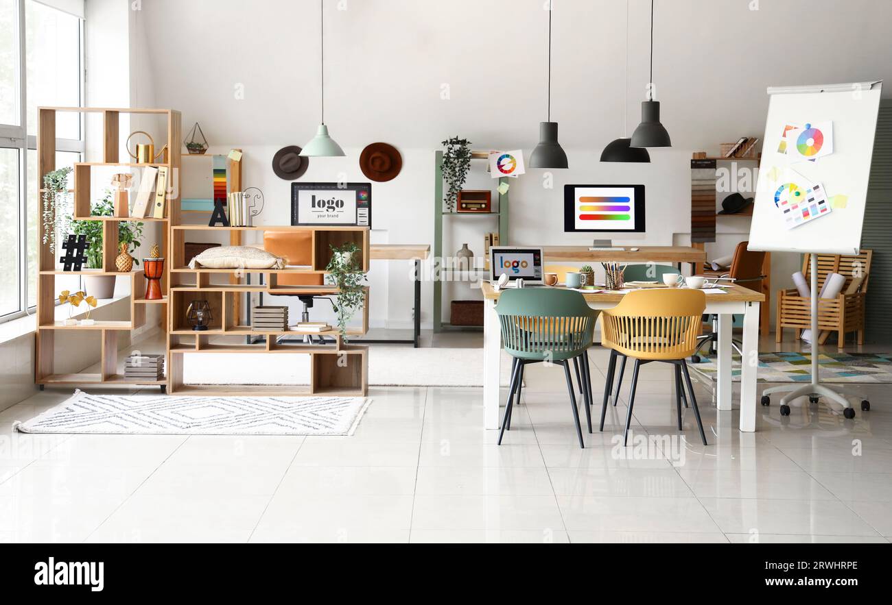 Interior of office with graphic designer's workplaces Stock Photo - Alamy