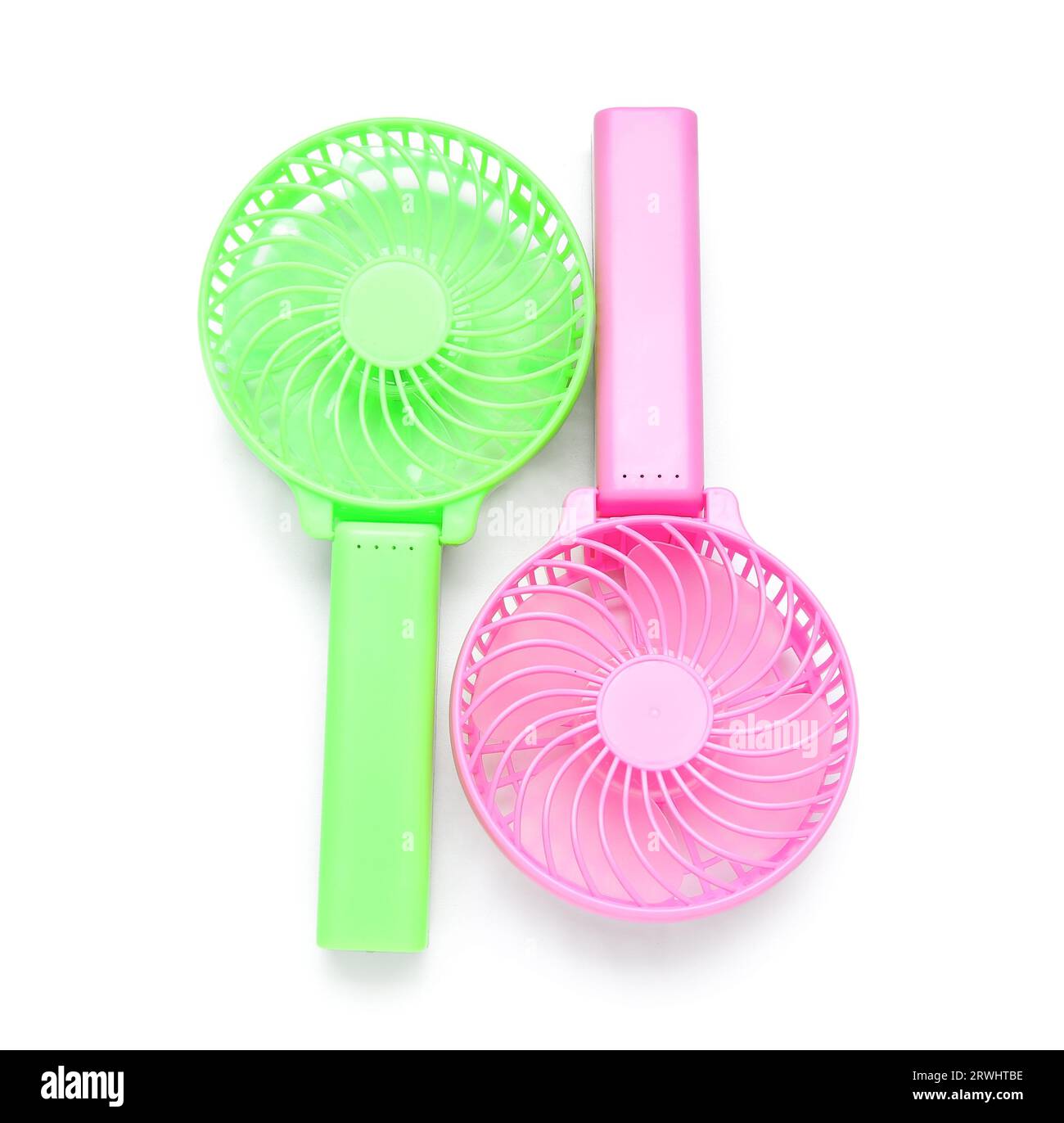 Different small electric fans on white background Stock Photo - Alamy