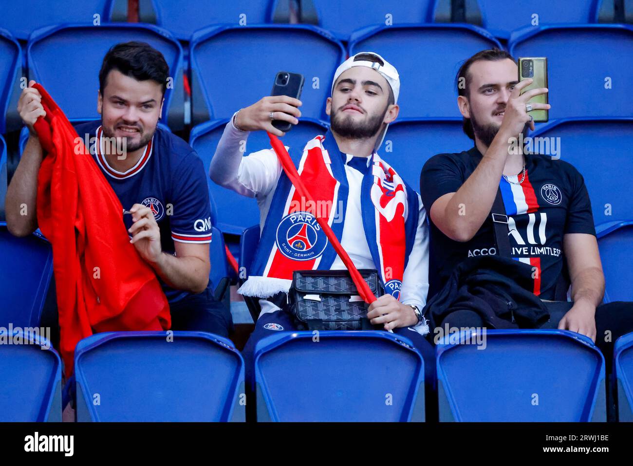 PARIS, FRANCE - SEPTEMBER 19: Fans of Borussia Dortmund Schaut during ...