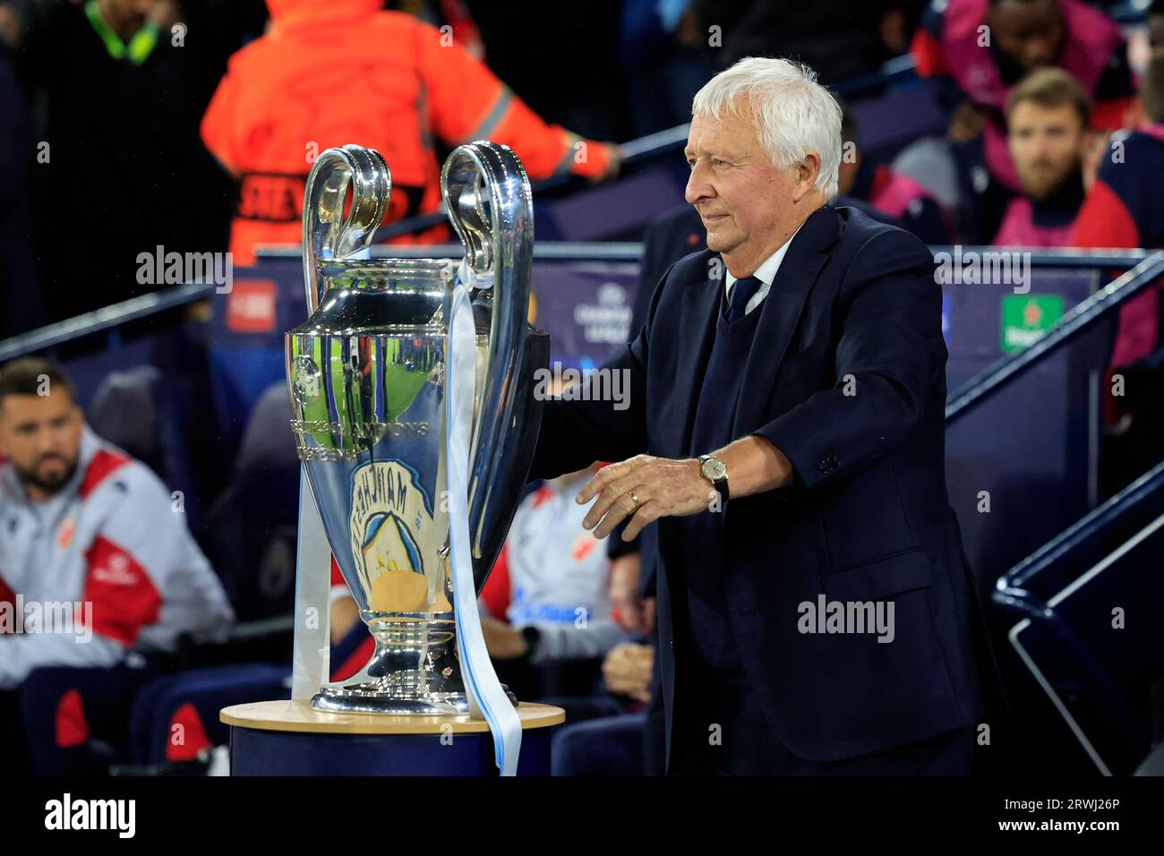 Mike Summerbee brings out the Champions League trophy at the start of ...