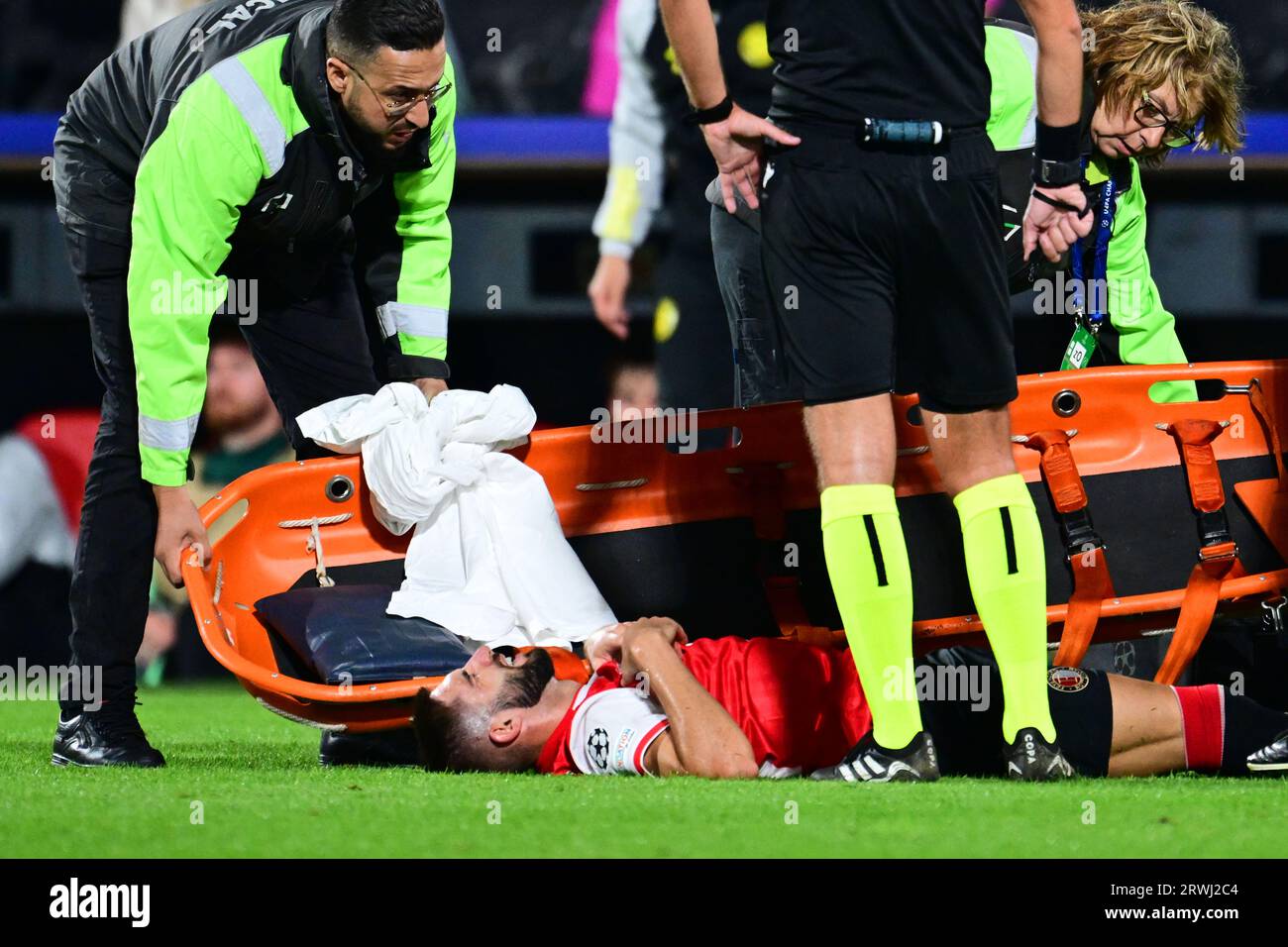ROTTERDAM - Feyenoord's Luka Ivanusec is injured in a duel with Celtic ...