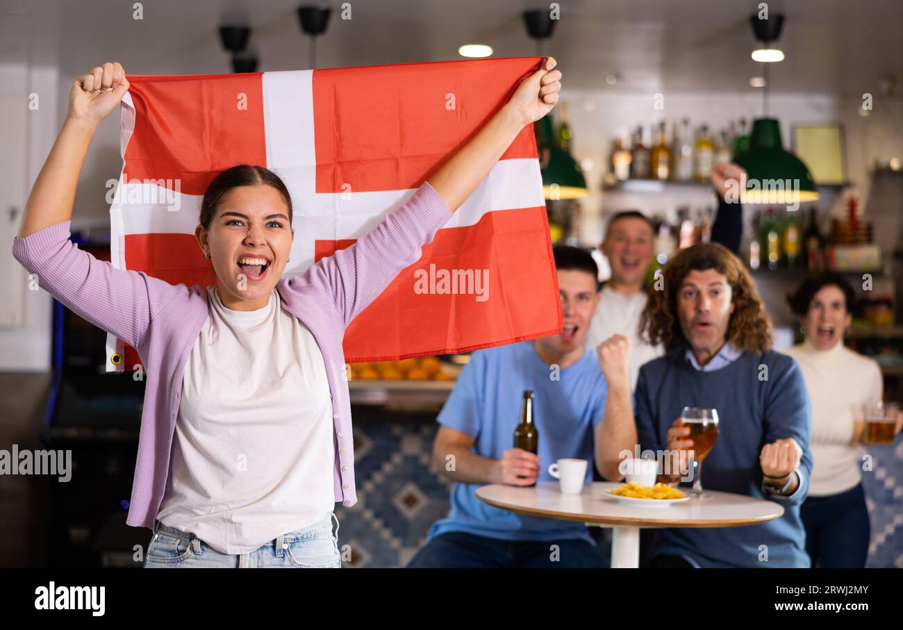 Danish fans scream with joy in beer bar. Denmark win Stock Photo - Alamy
