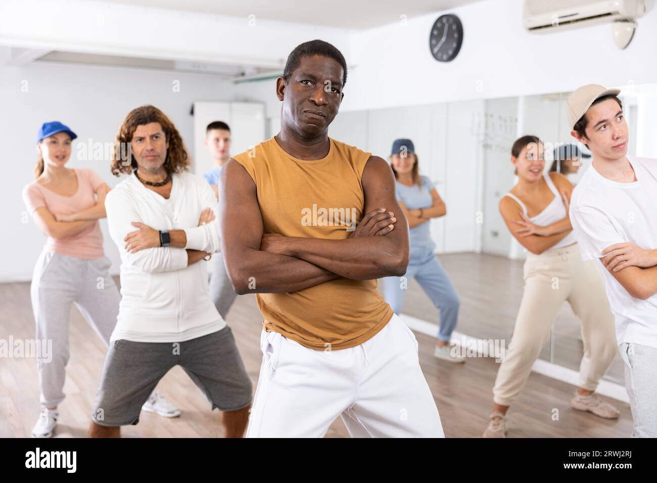 African american man practicing active dance moves during rehearsal ...