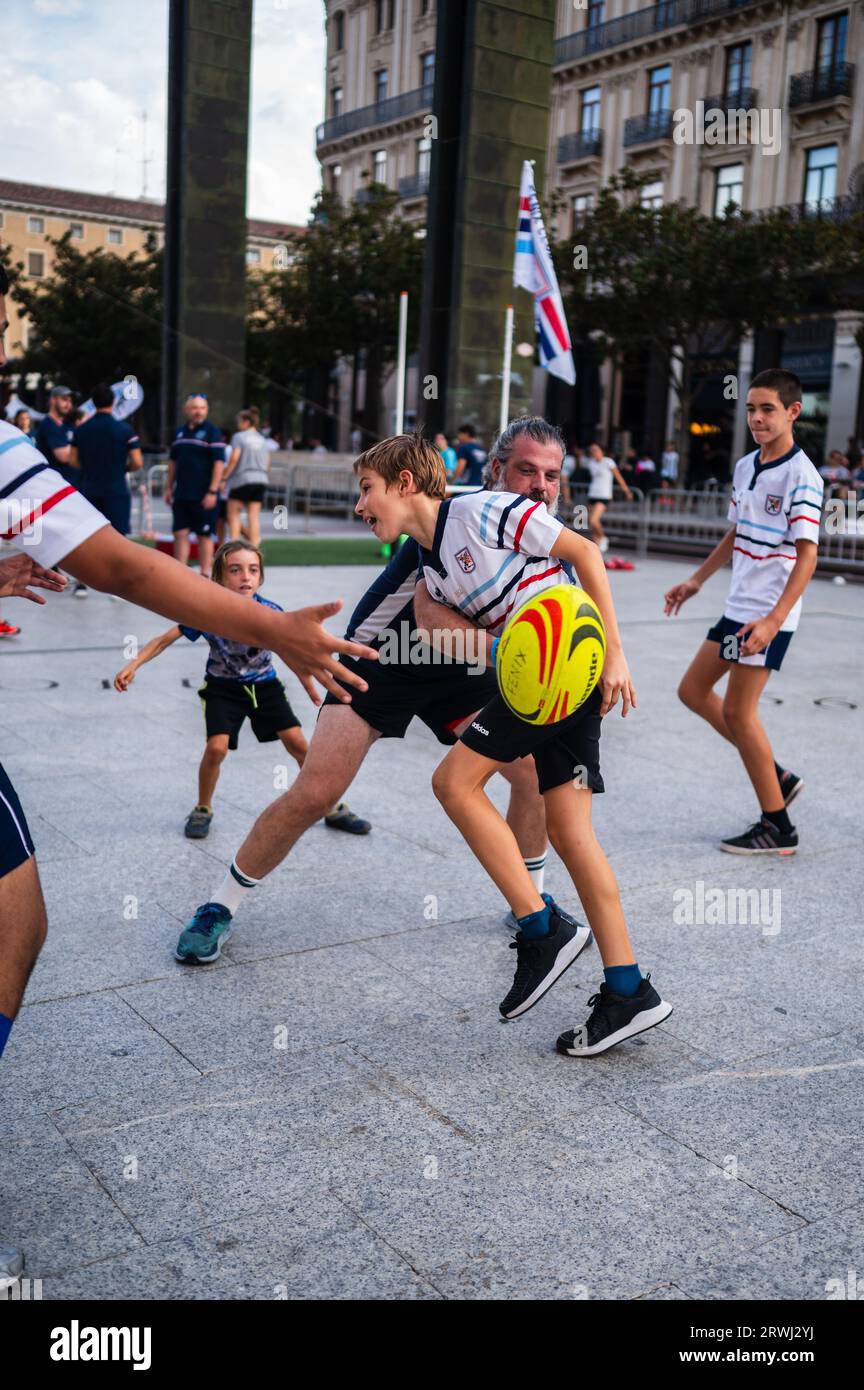 Kids trying rugby during Sports Day multi-sports street event in Plaza ...