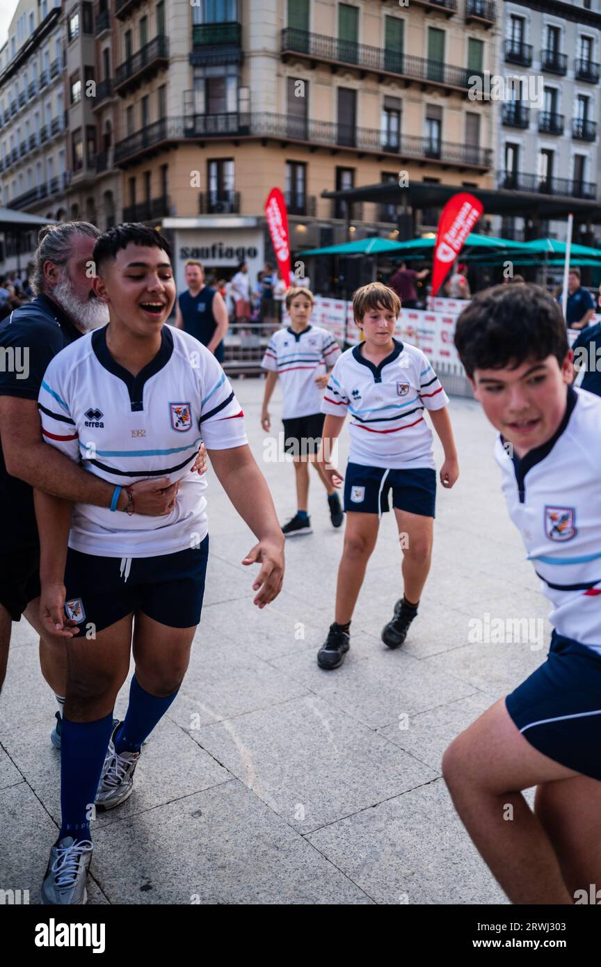 Kids trying rugby during Sports Day multi-sports street event in Plaza ...
